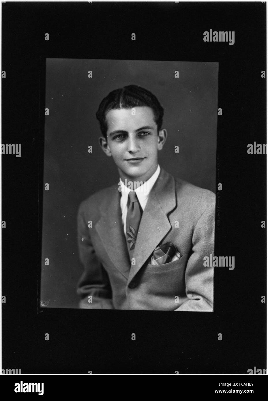A photograph of an unidentified man, the subject shown in a portrait ...