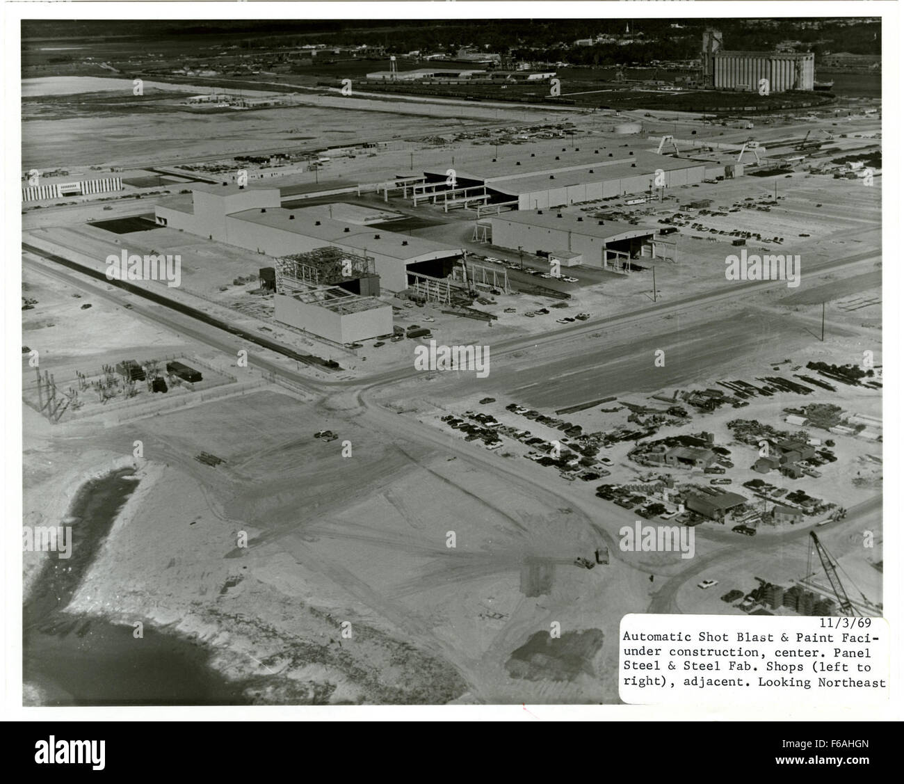 An automatic shot blast and paint facility under construction, focusing ...