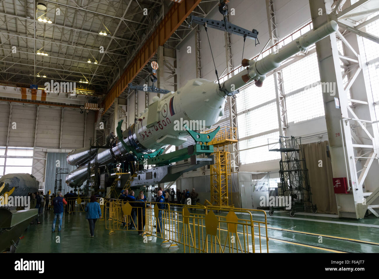The Soyuz TMA-14M rocket for Expedition 41 is assembled at Baikonur ...