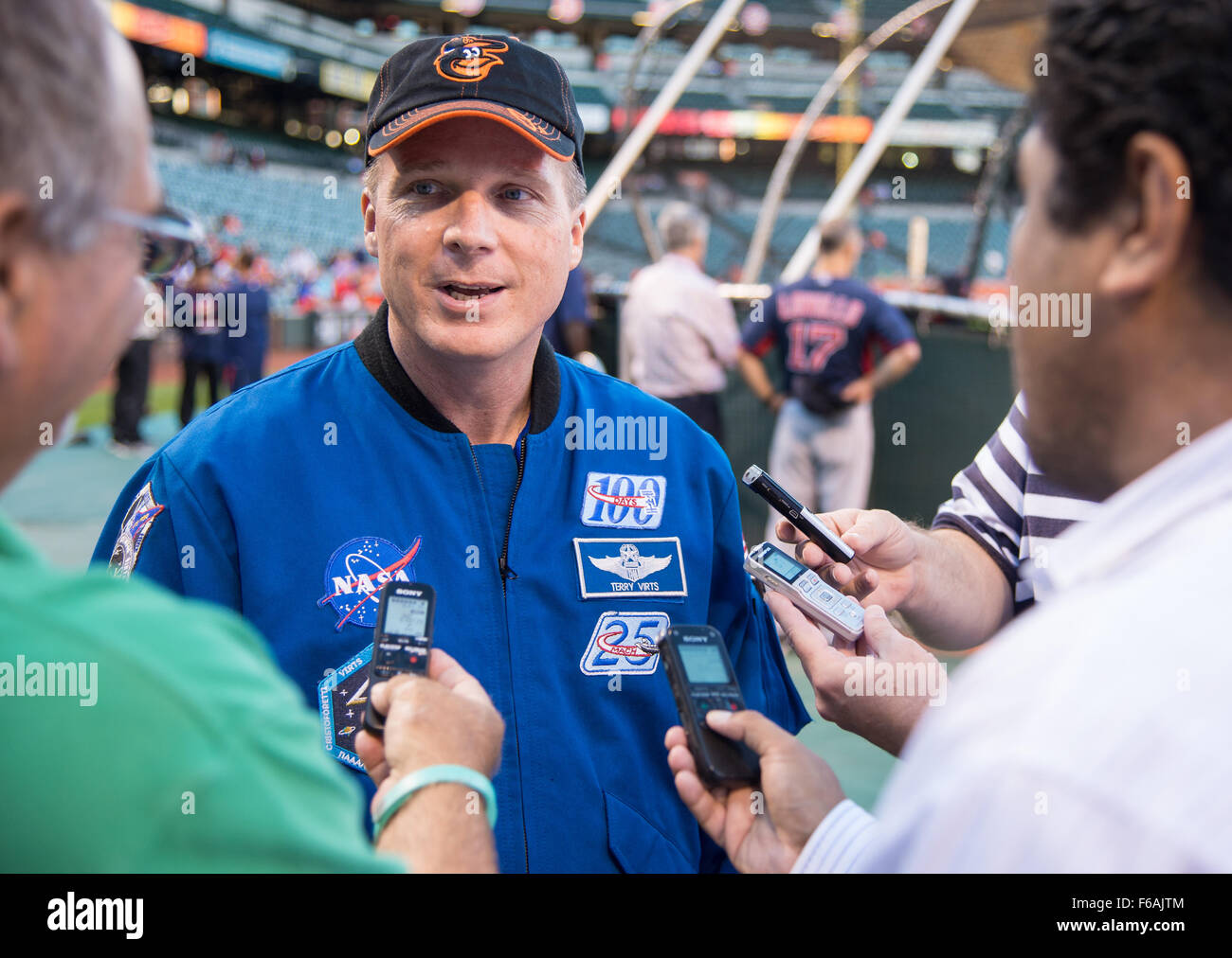 Astronaut Terry Virts throws the ceremonial first pitch at a 2015 ...