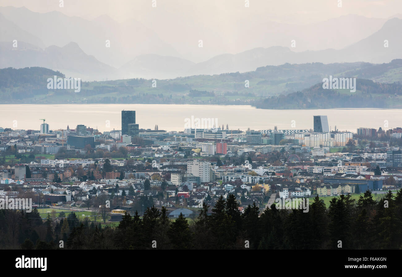 The Swiss city of Zug and Baar with Lake Zug and Swiss mountains in the ...