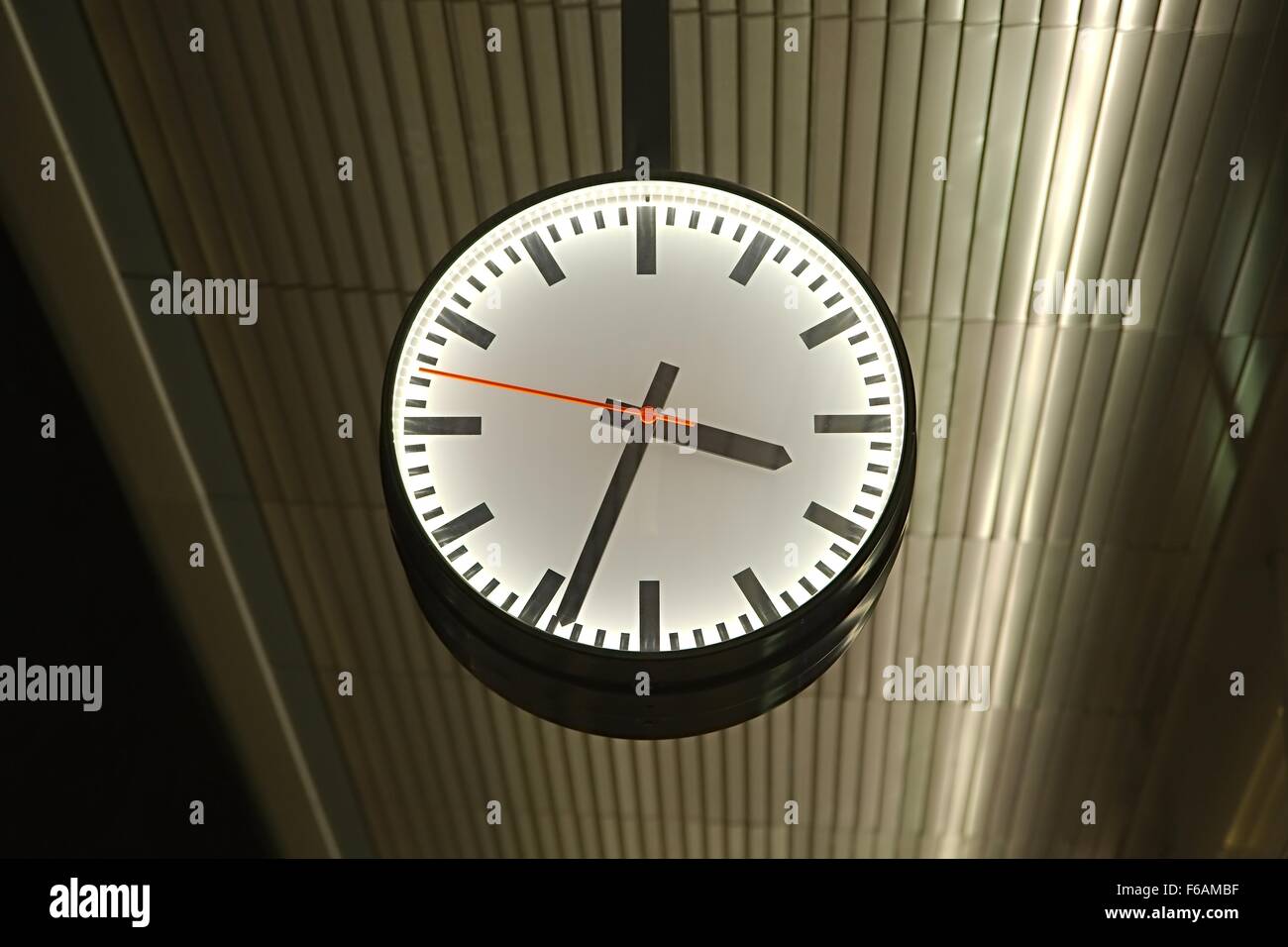 Clock at a Station Stock Photo - Alamy