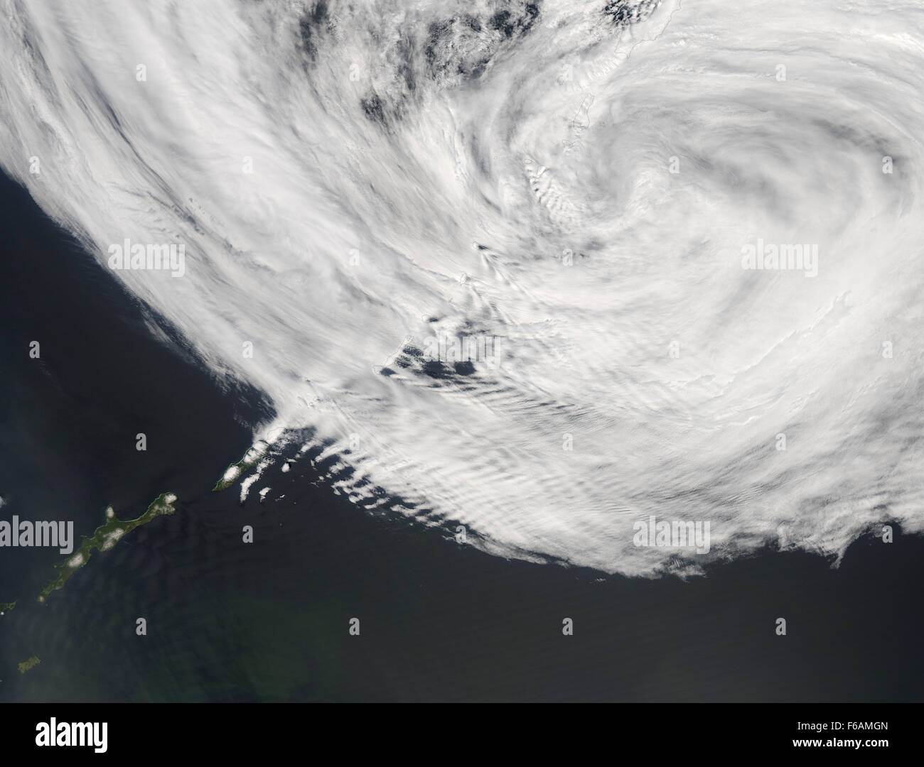 Wave-shaped clouds, induced by Kuril Island's topography, are observed ...