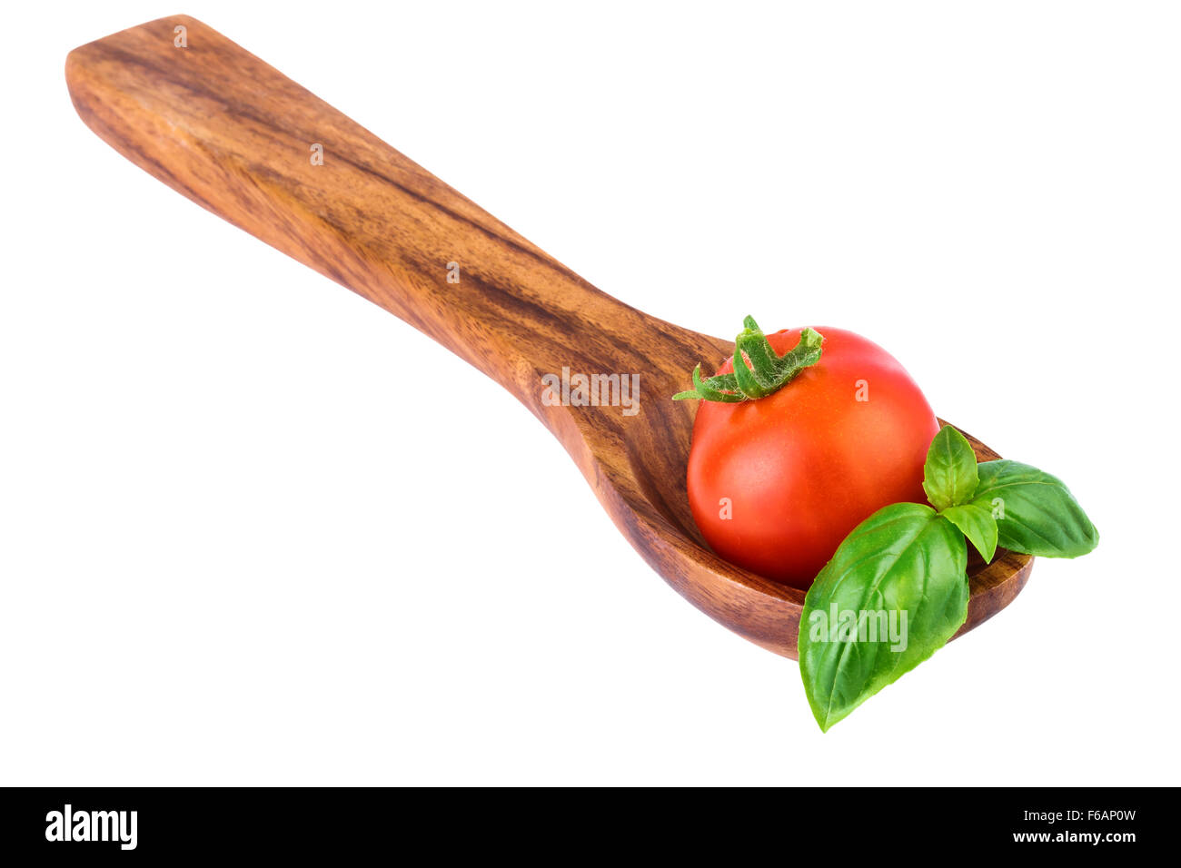 Red Tomato Wooden Spoon Stock Photo - Alamy