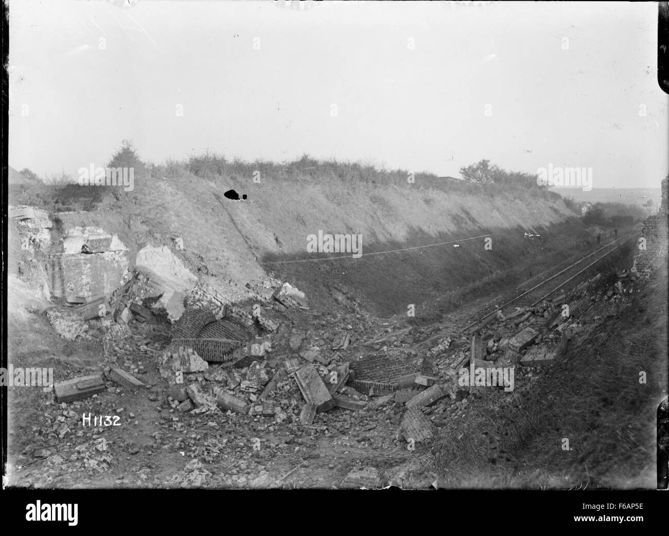 This historical photograph shows the destruction of a bridge during ...