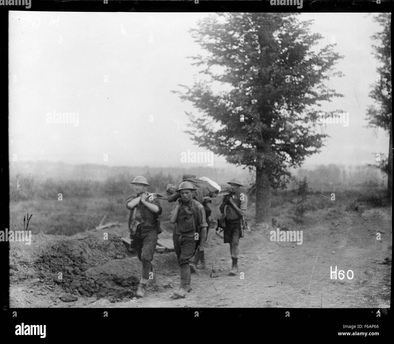 Soldier carrying wounded comrade hi-res stock photography and images ...
