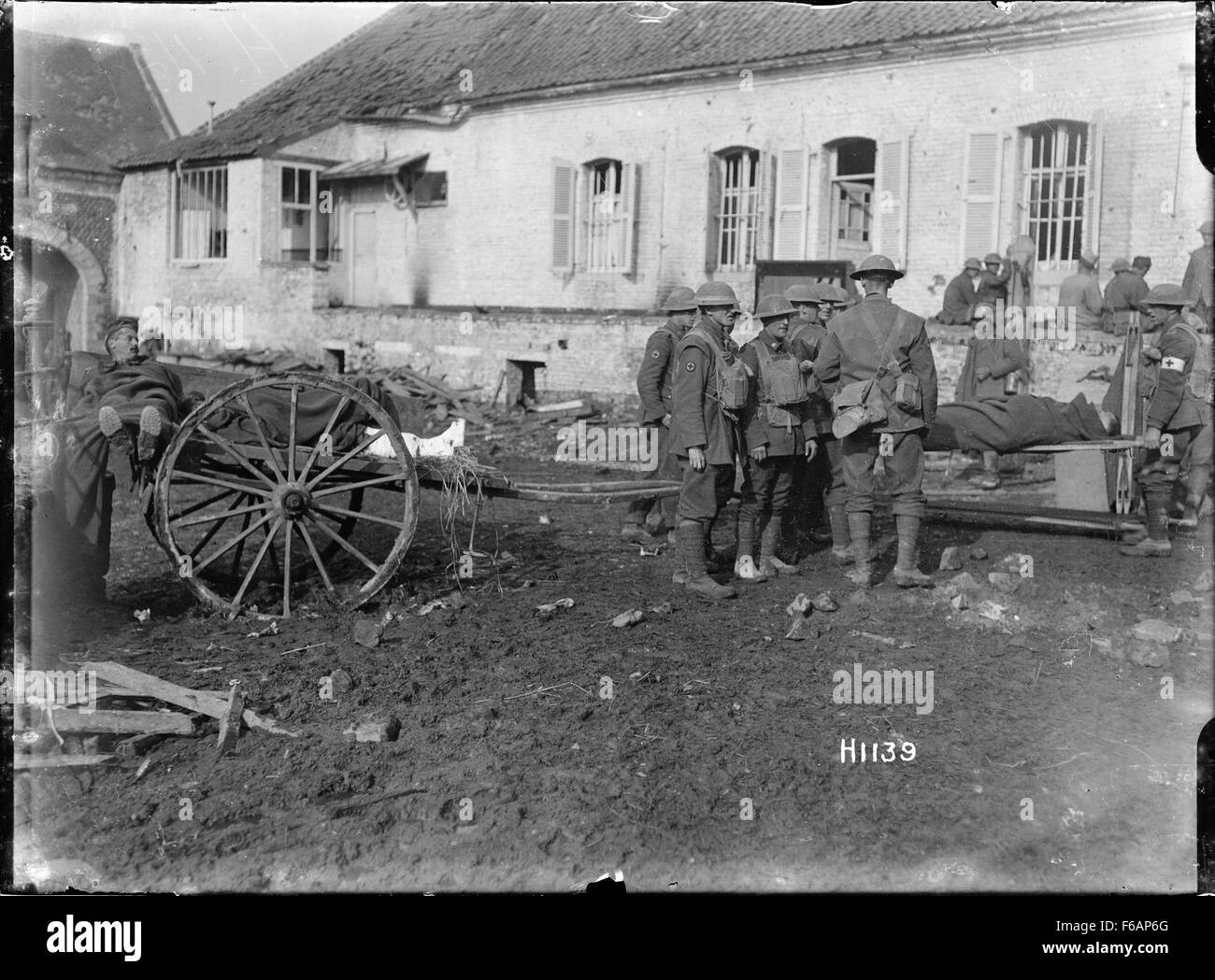 This historic photograph depicts New Zealand soldiers assisting wounded ...