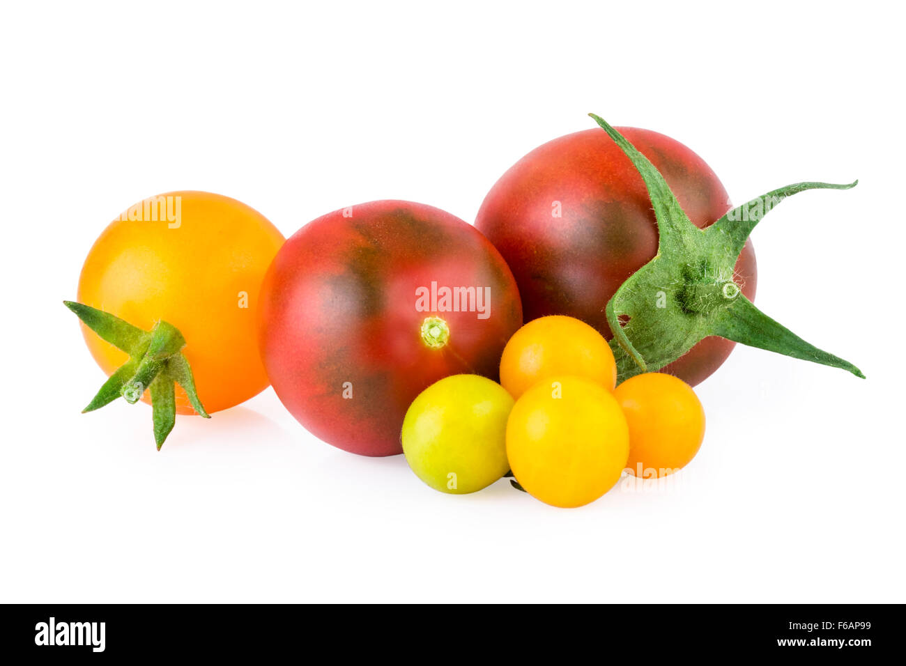 Red tomato on plant Cut Out Stock Images & Pictures - Alamy