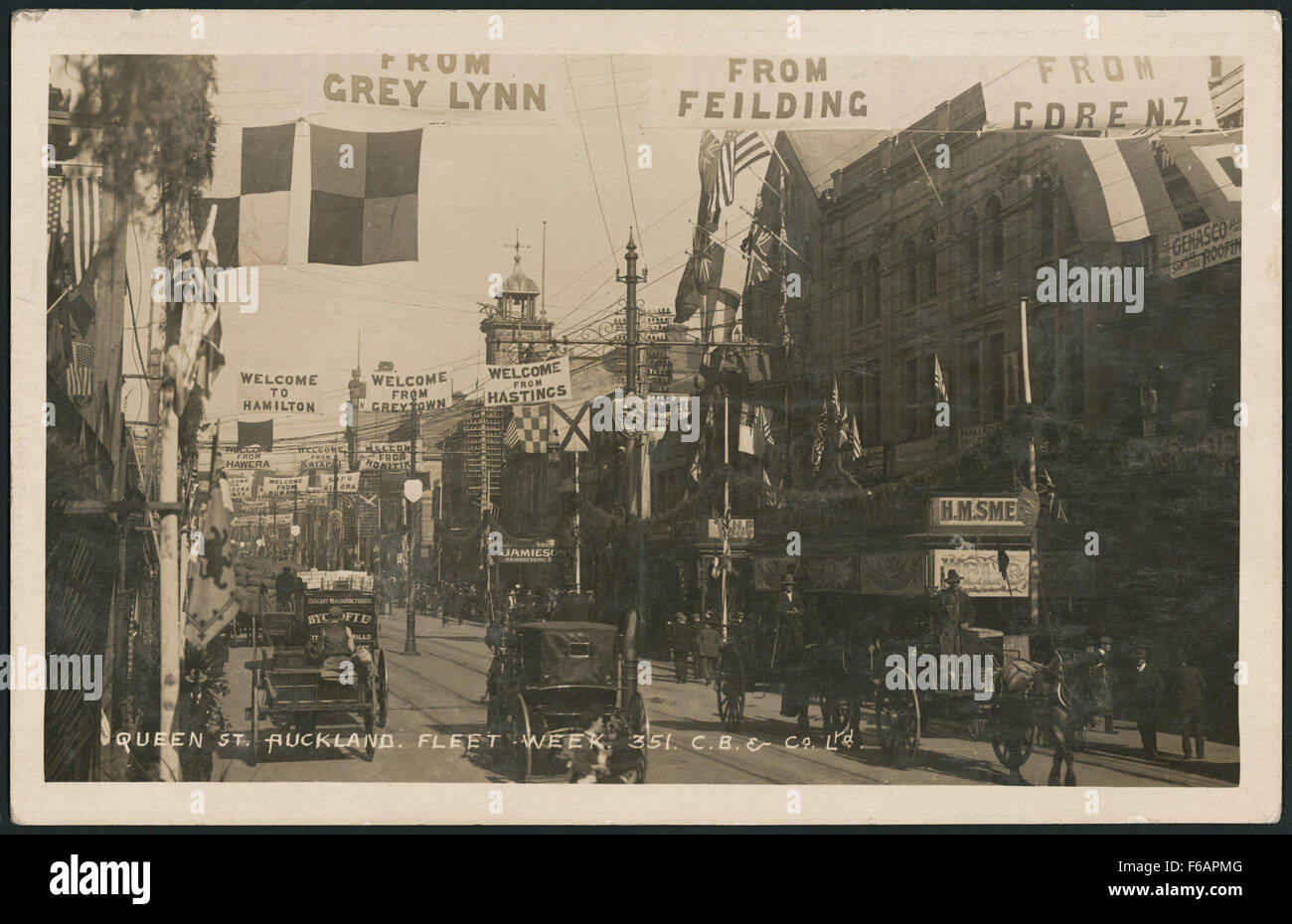 This vintage postcard of Queen Street, Auckland, features a scene from ...