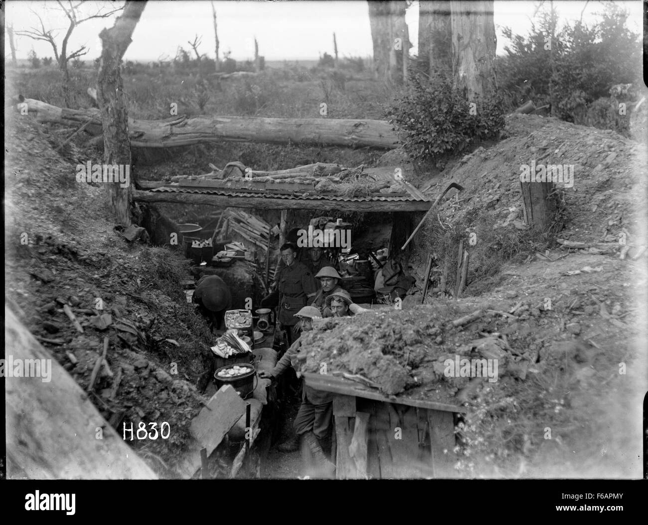 This photo shows soldiers preparing a meal in the trenches near ...