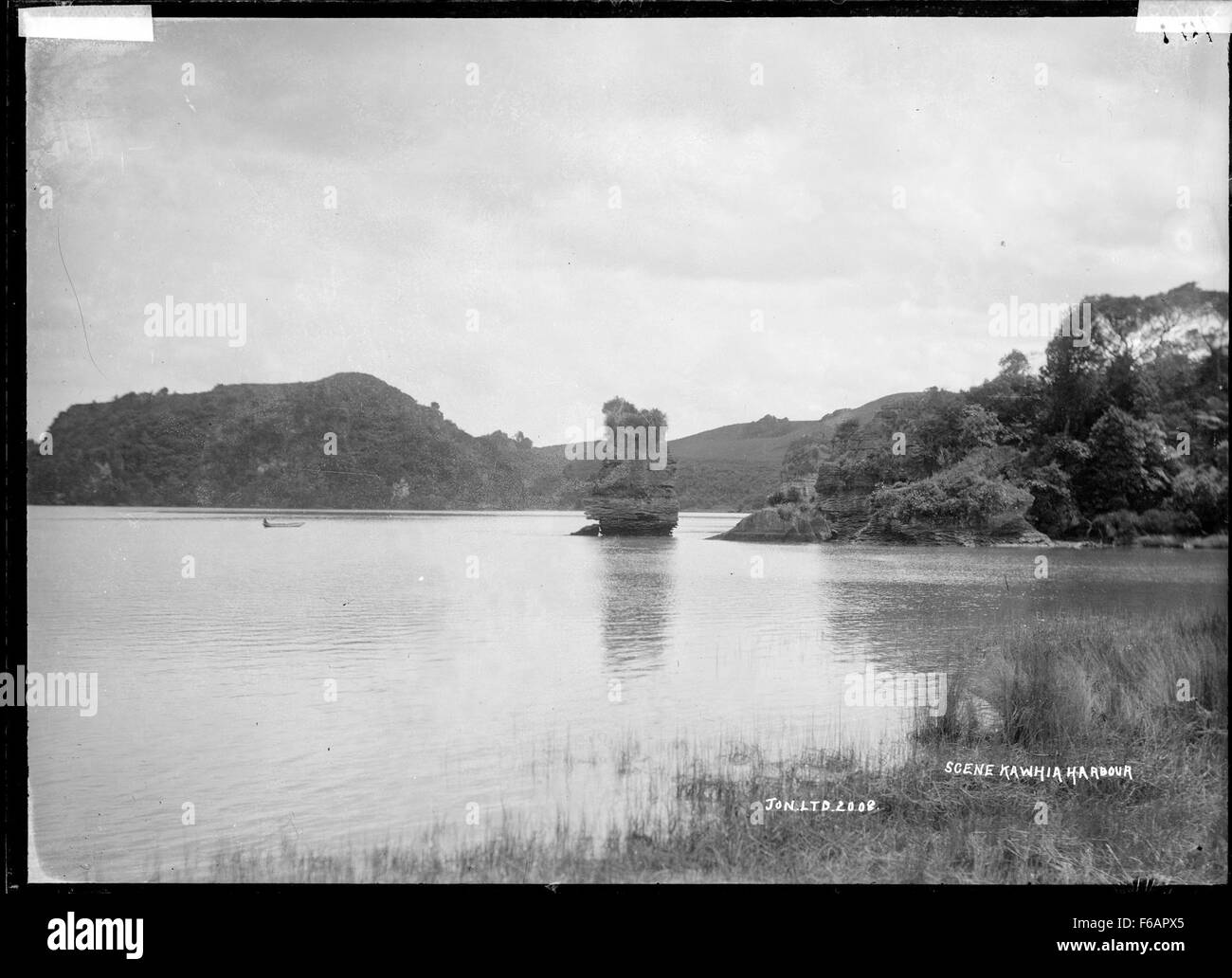 This photograph captures the serene beauty of Rakaunui Inlet in Kawhia ...