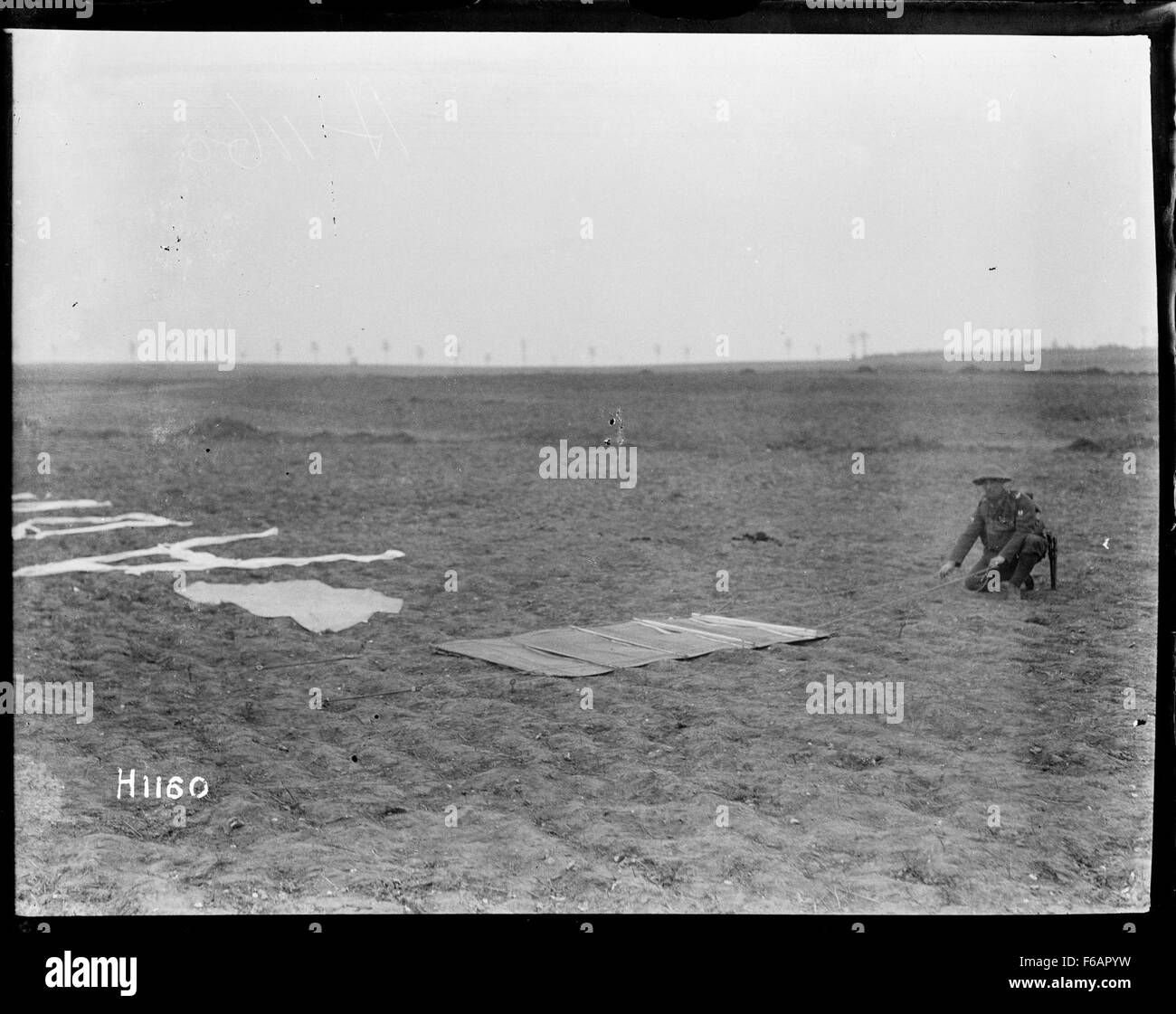 The image depicts military personnel rehearsing signals for contacting ...