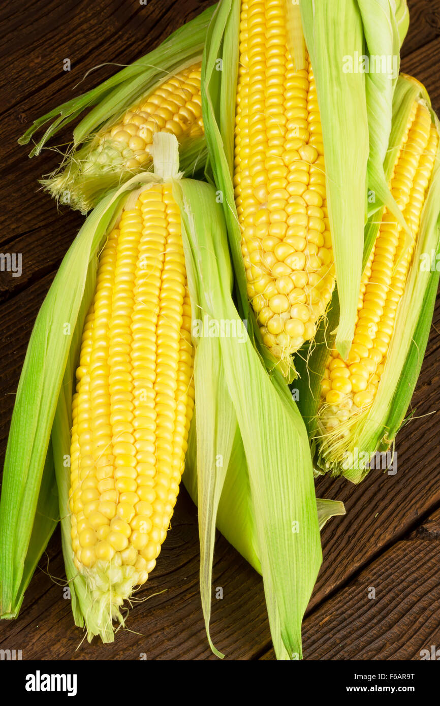 Corn Cob on Wooden Background Stock Photo - Alamy
