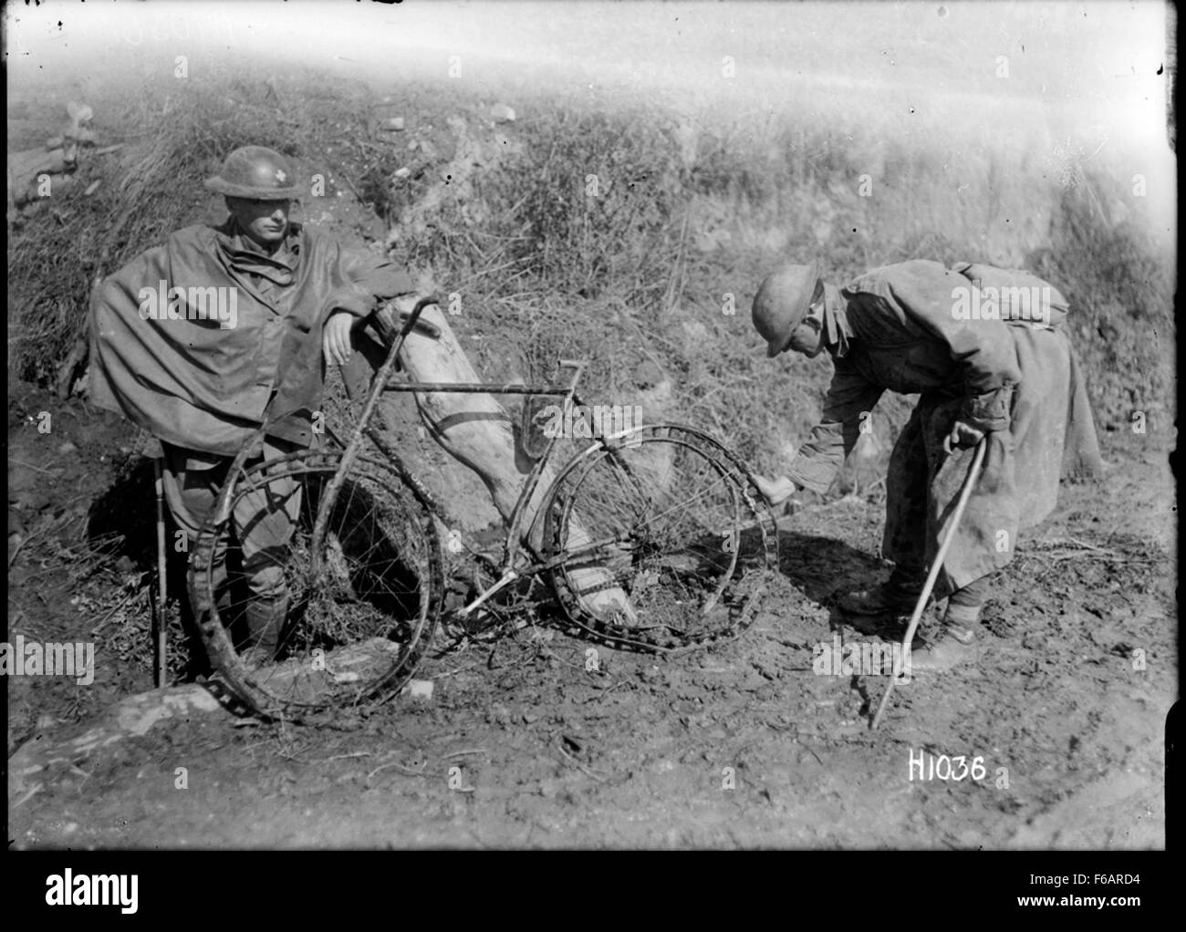 Soldiers inspect a unique German bicycle designed with spring-loaded ...