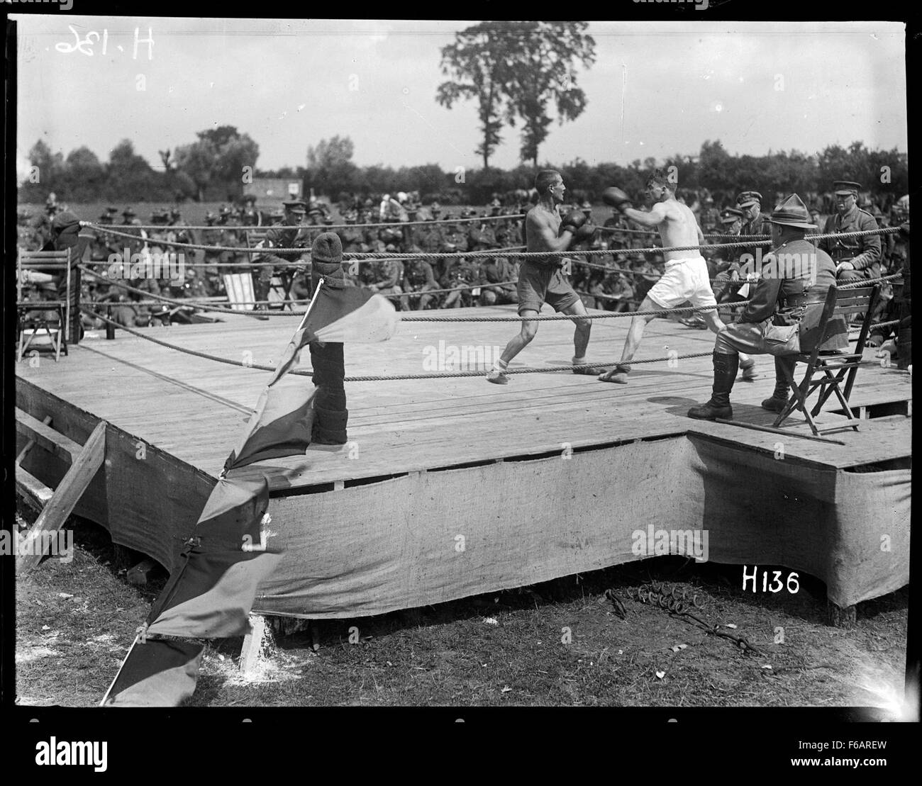 This photograph captures a moment of sparring in the boxing ring at the ...
