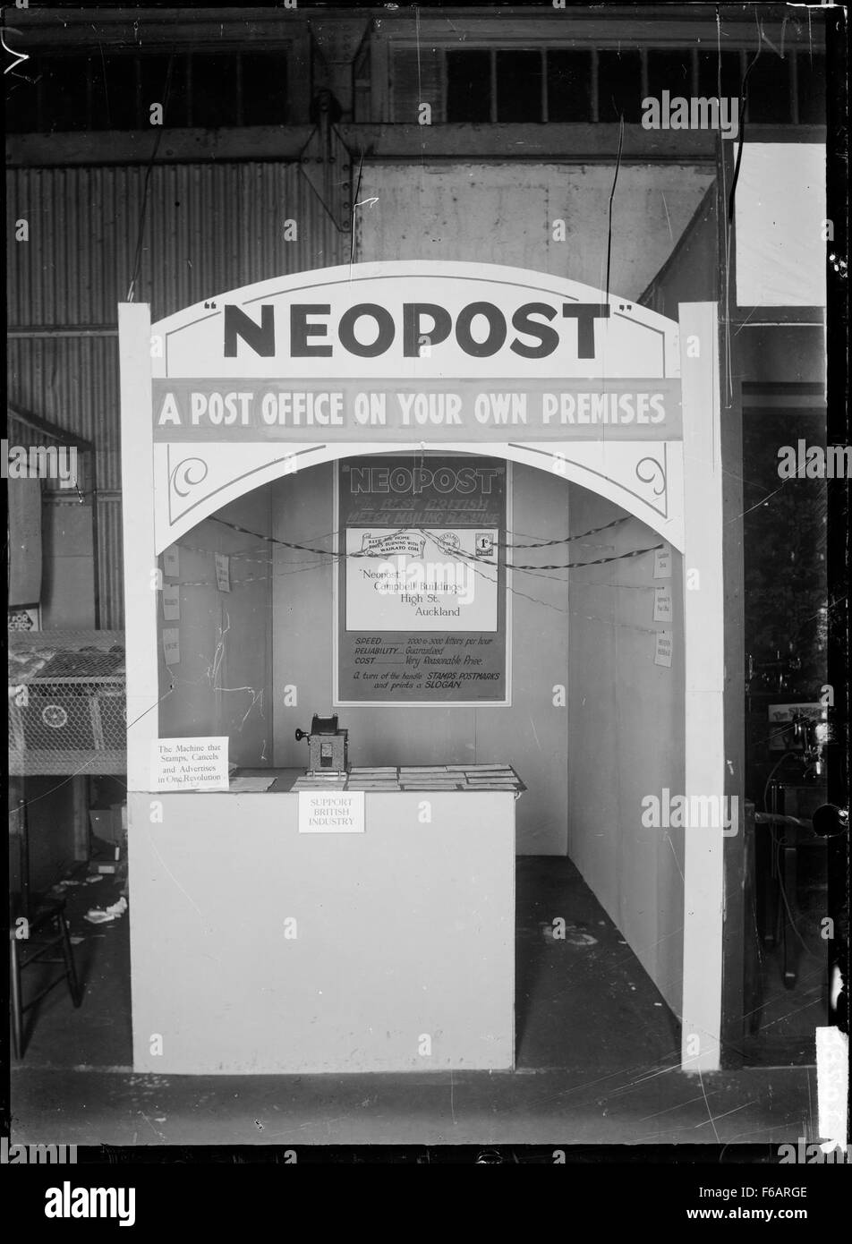 This image depicts a trade fair stall showcasing *Neopost A*, likely a ...