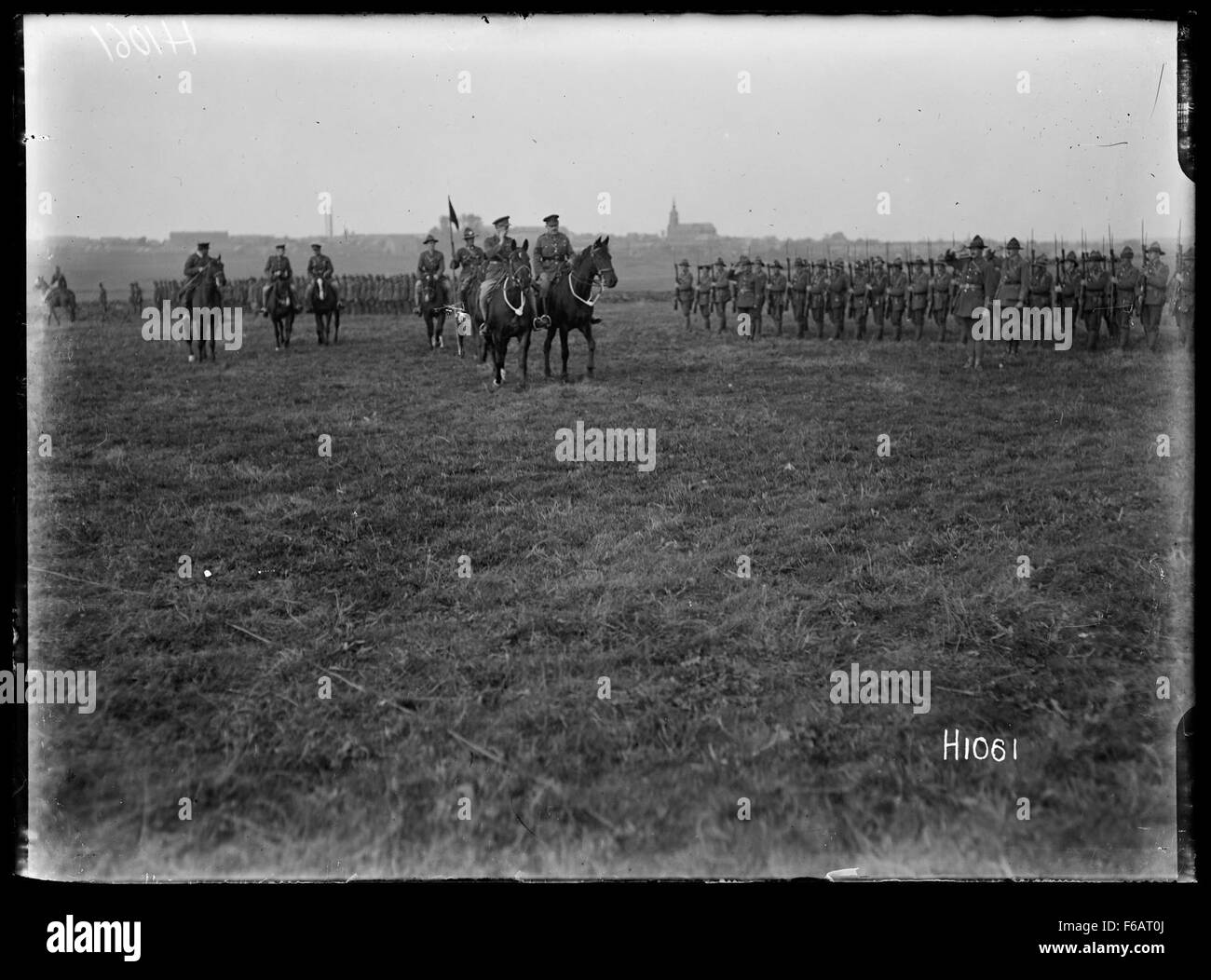 This historical image depicts the Prince of Wales reviewing New Zealand ...