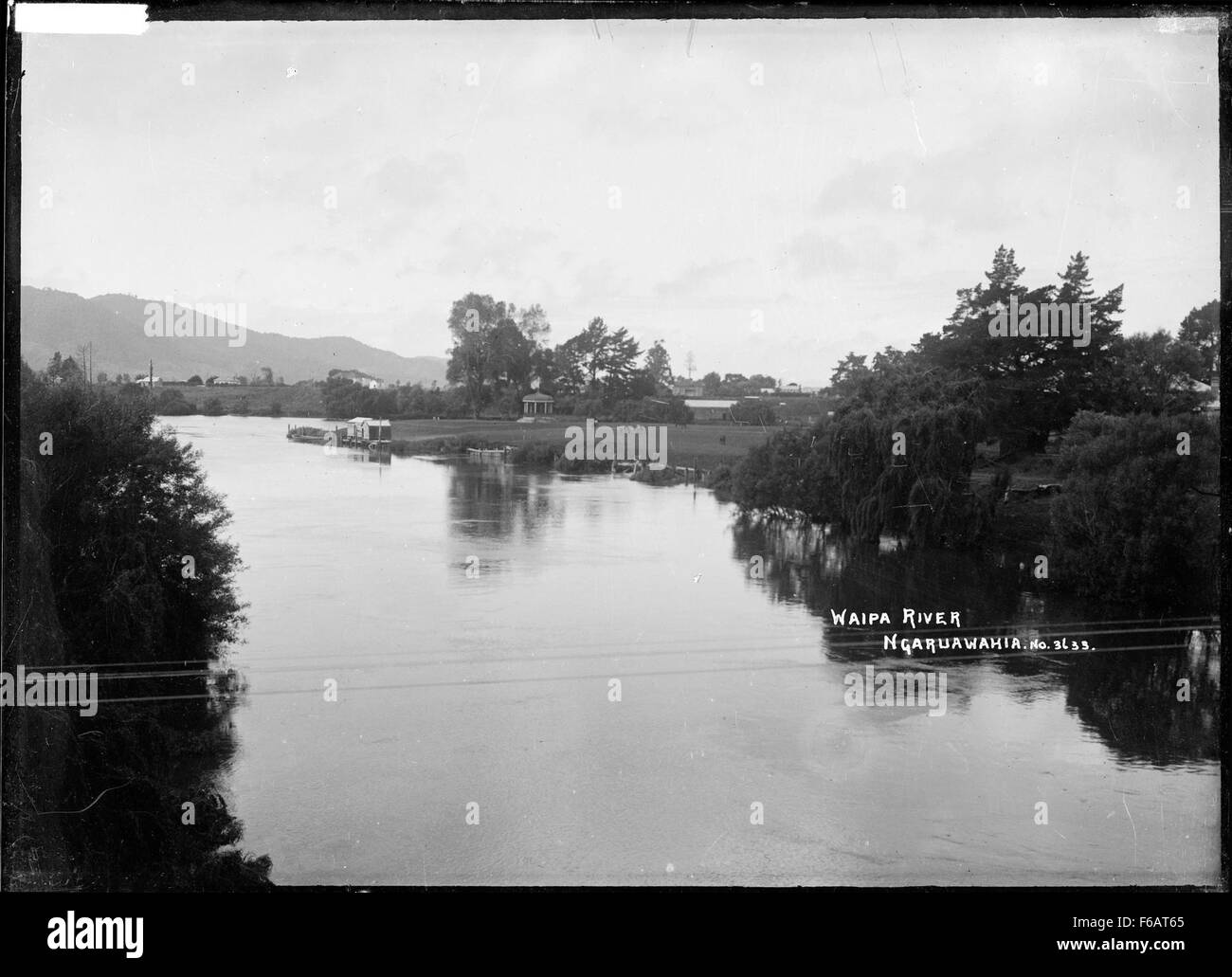 The Waipa River, located at Ngaruawahia in New Zealand, is depicted in ...