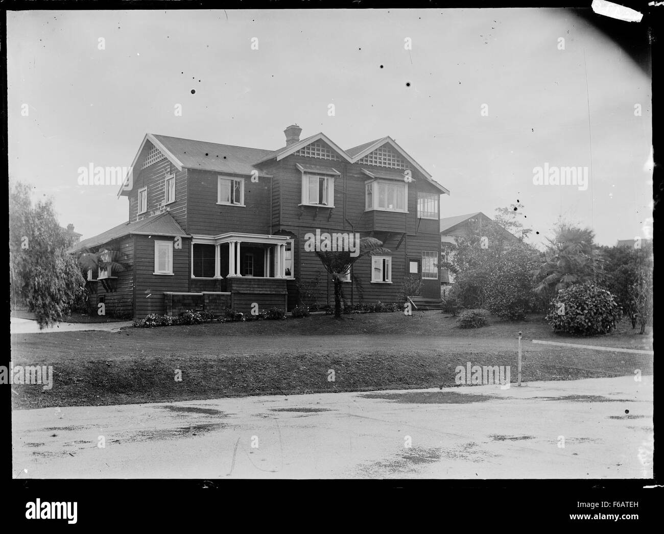 This two-storied wooden house represents traditional architecture ...