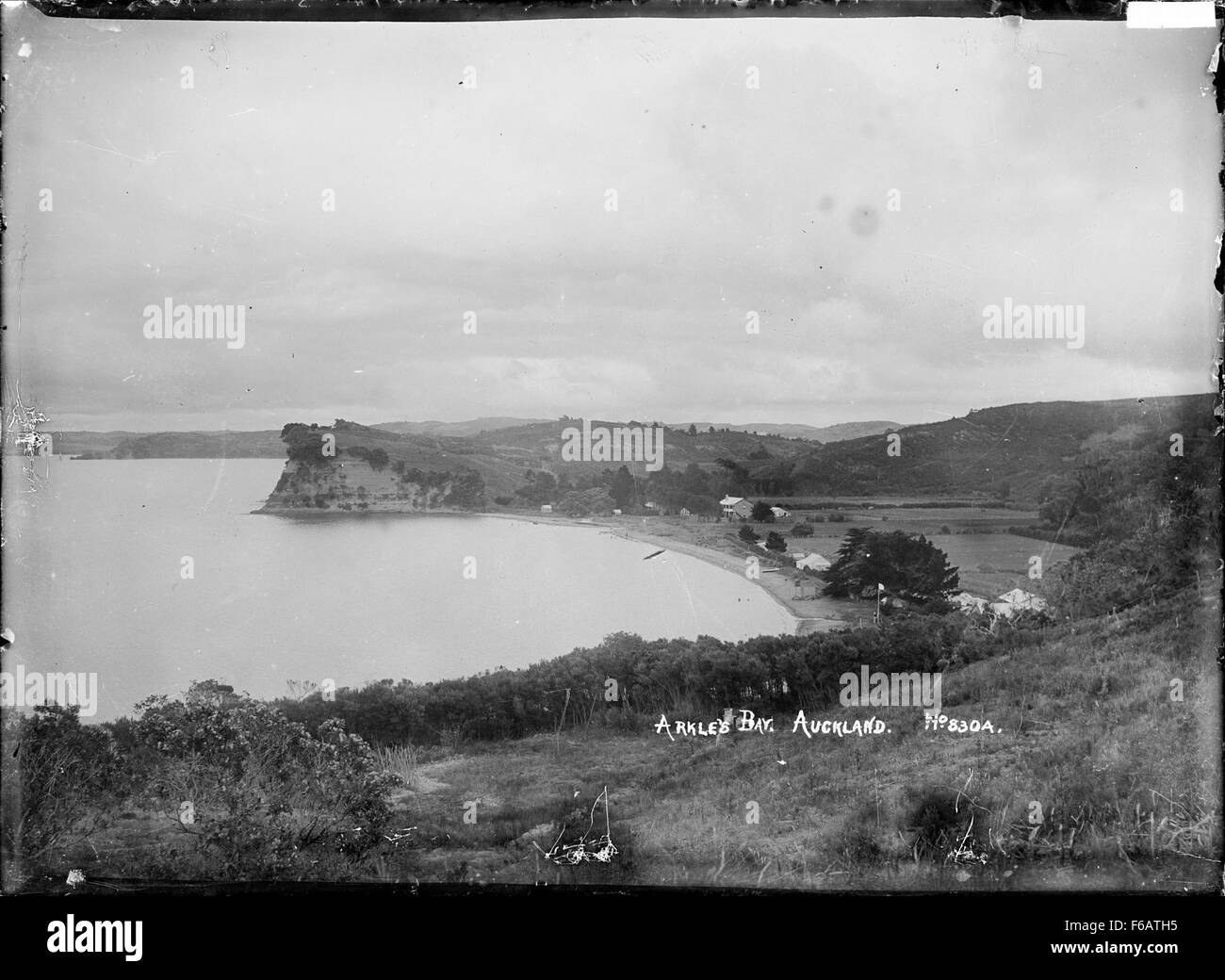 This photograph offers a view of Arkles Bay in Auckland, New Zealand ...