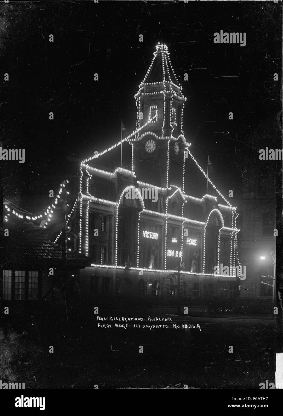 View of Auckland Ferry Building taken at night to show Stock Photo - Alamy