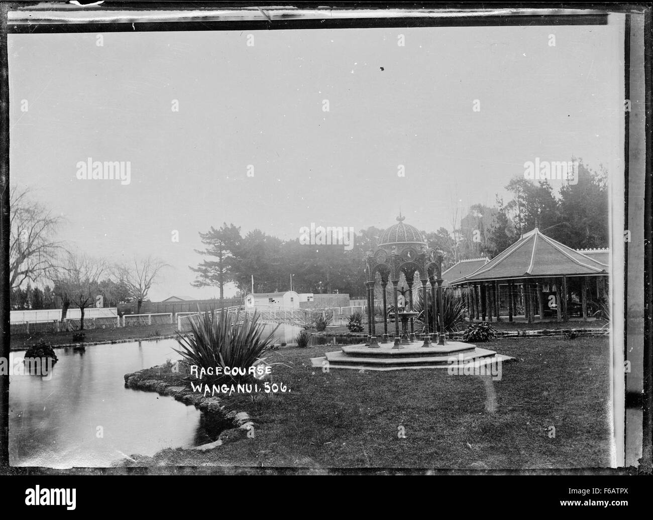 This photograph depicts the lush gardens behind the grandstand at the ...