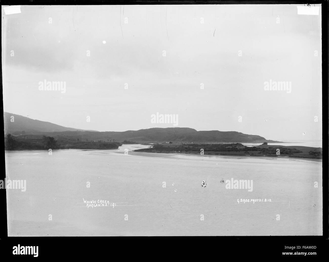This 1910 photograph by Gilmour depicts Wainui Creek in Raglan County ...