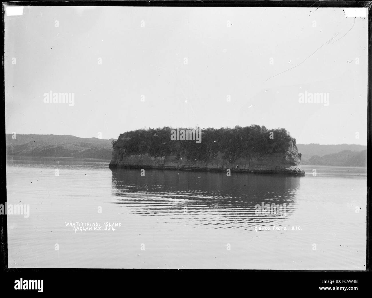 This 1910 photograph by Gilmour captures a serene view of Whatitirinui ...