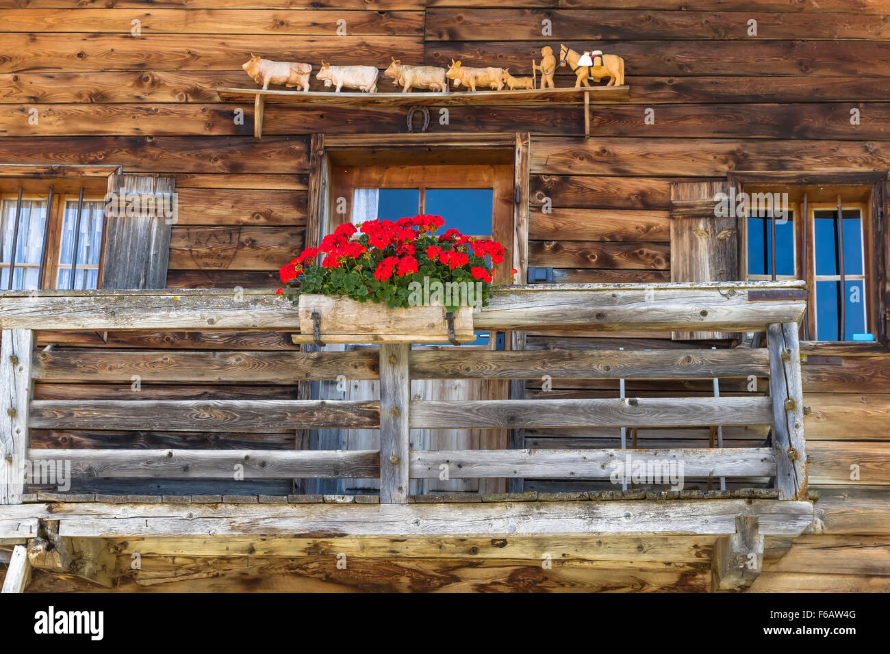 Rustic wall and window in a alpine hut Stock Photo - Alamy