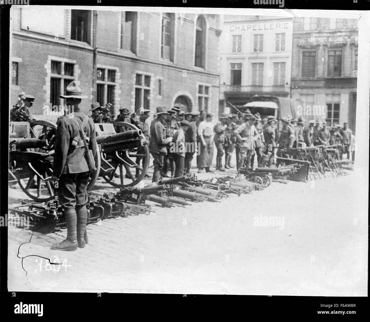This photograph depicts World War I artillery pieces captured at ...