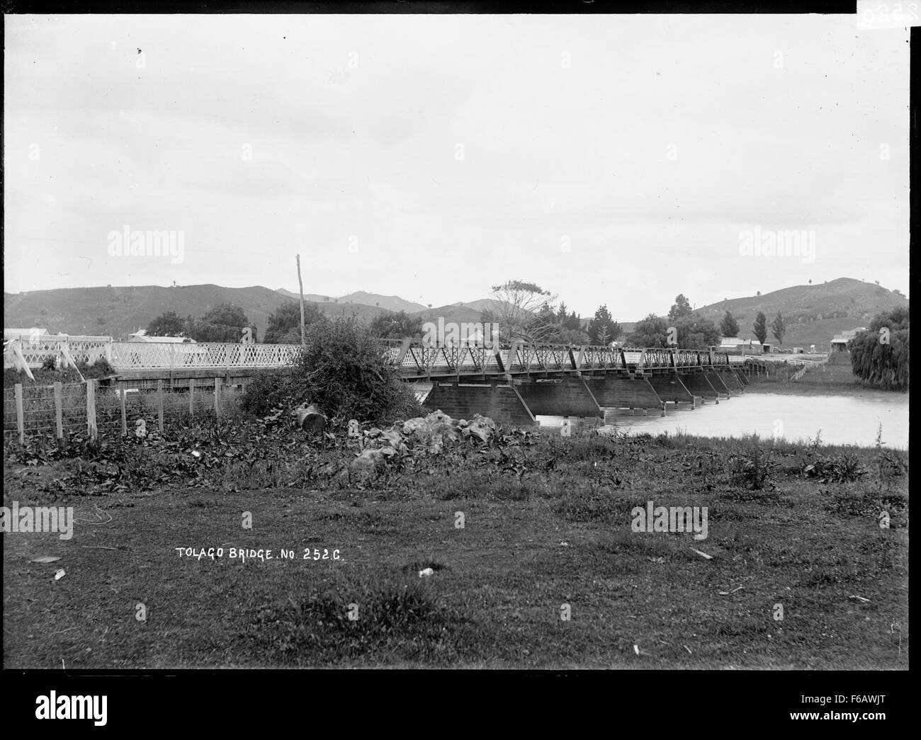 The bridge over the Uawa River in Tolaga Bay, New Zealand, is a ...