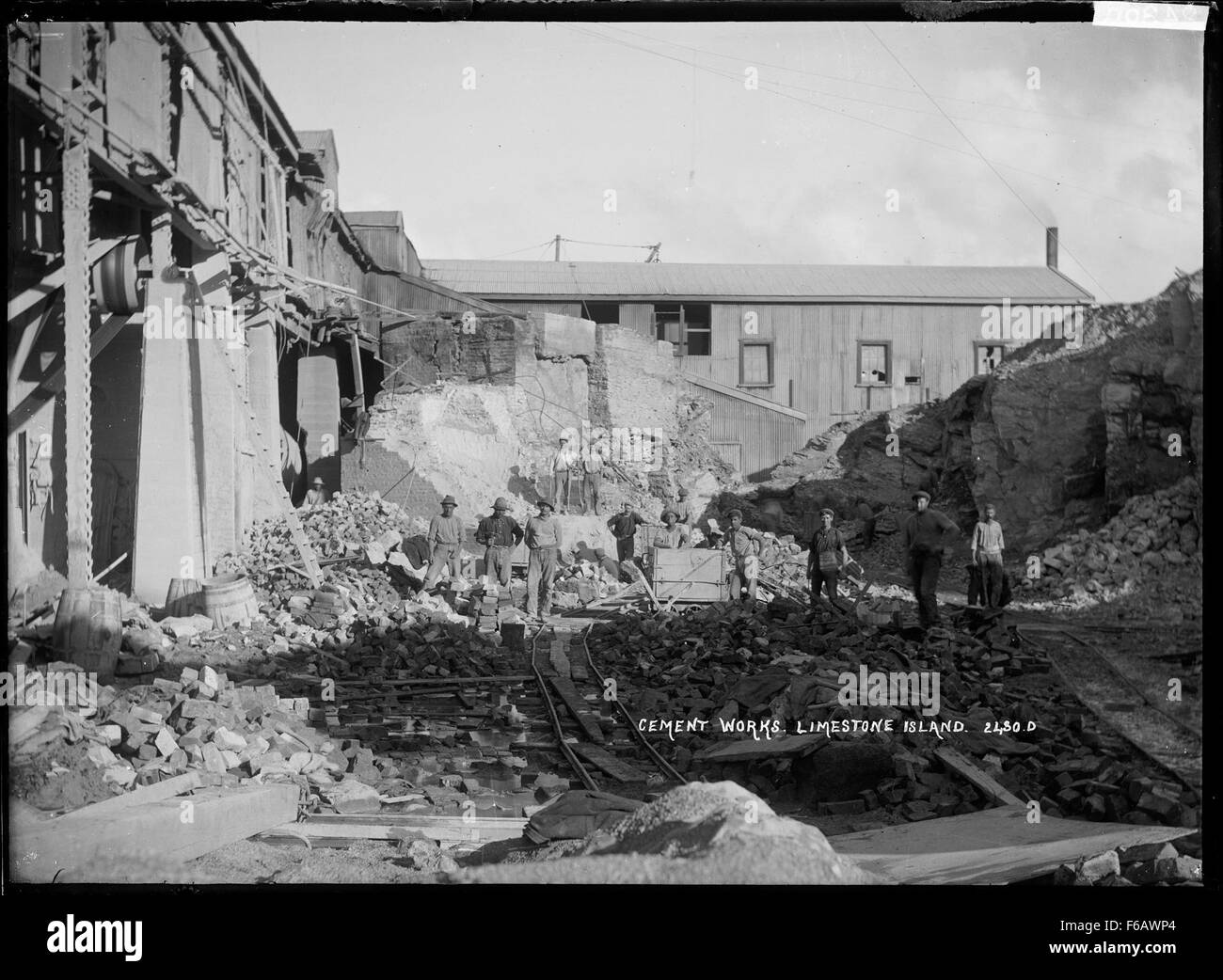 This photograph shows cement works and employees on Limestone Island in ...