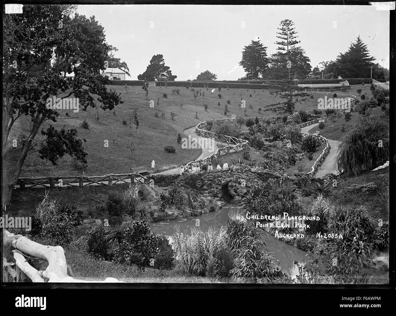 This photograph captures children playing in Point Erin Park, Auckland ...