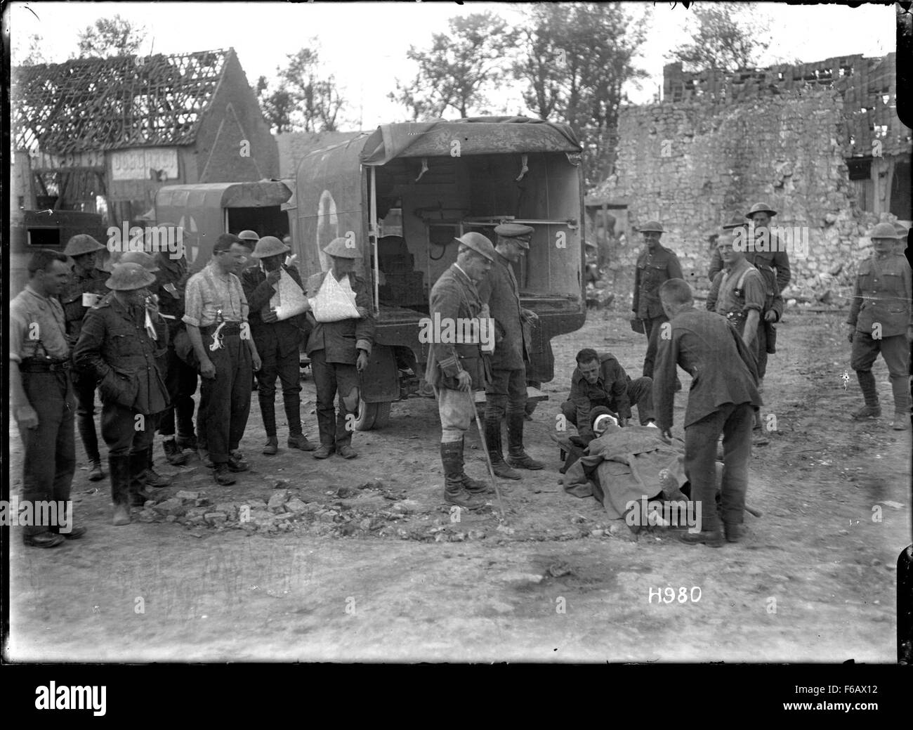A German medical officer watching the removal of the wounded Stock ...
