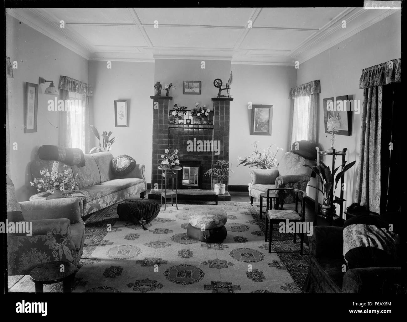 This artwork depicts an interior view of a drawing room, showcasing the ...