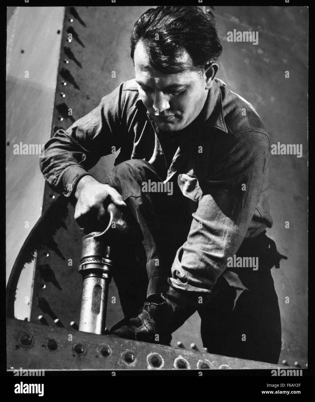 Building site worker in Black and White Stock Photos & Images - Alamy