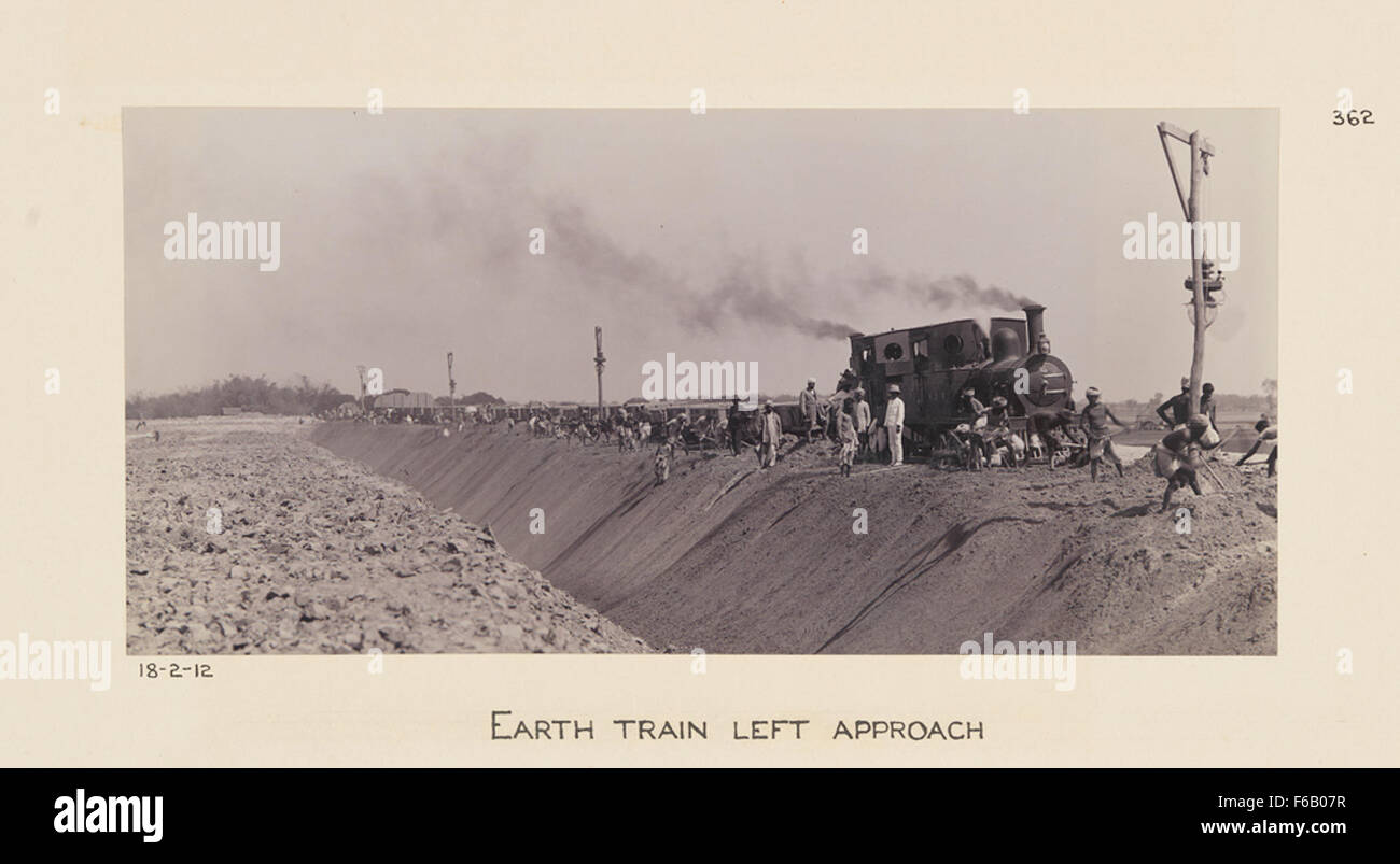 This image shows the construction of a railroad bridge with the Earth ...