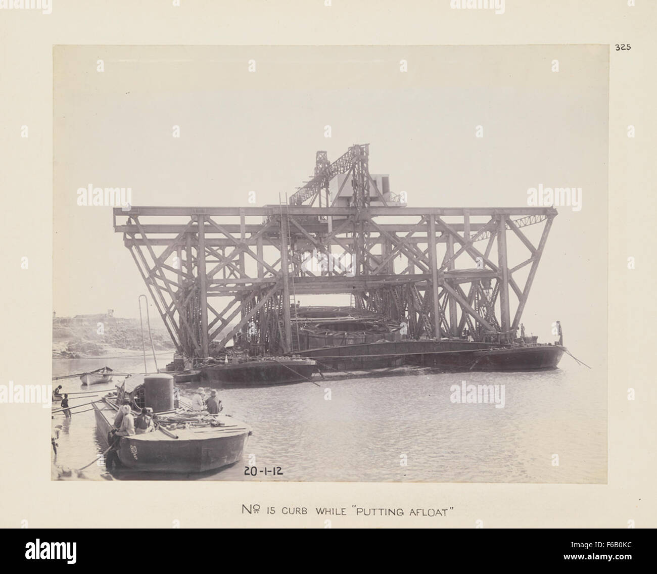 This image depicts the construction of a railroad bridge, showing the ...