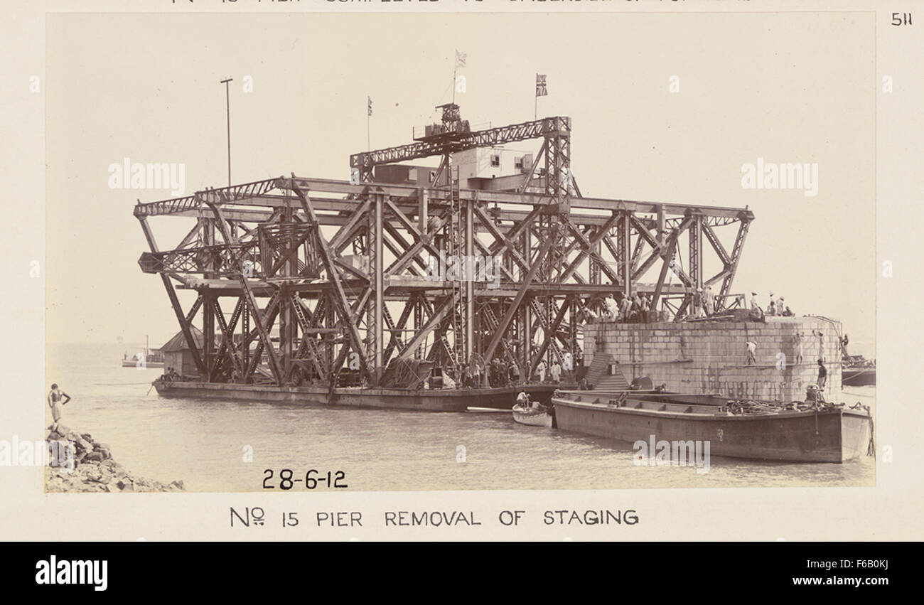 A photograph documenting the removal of a staging bridge at Pier 15 ...