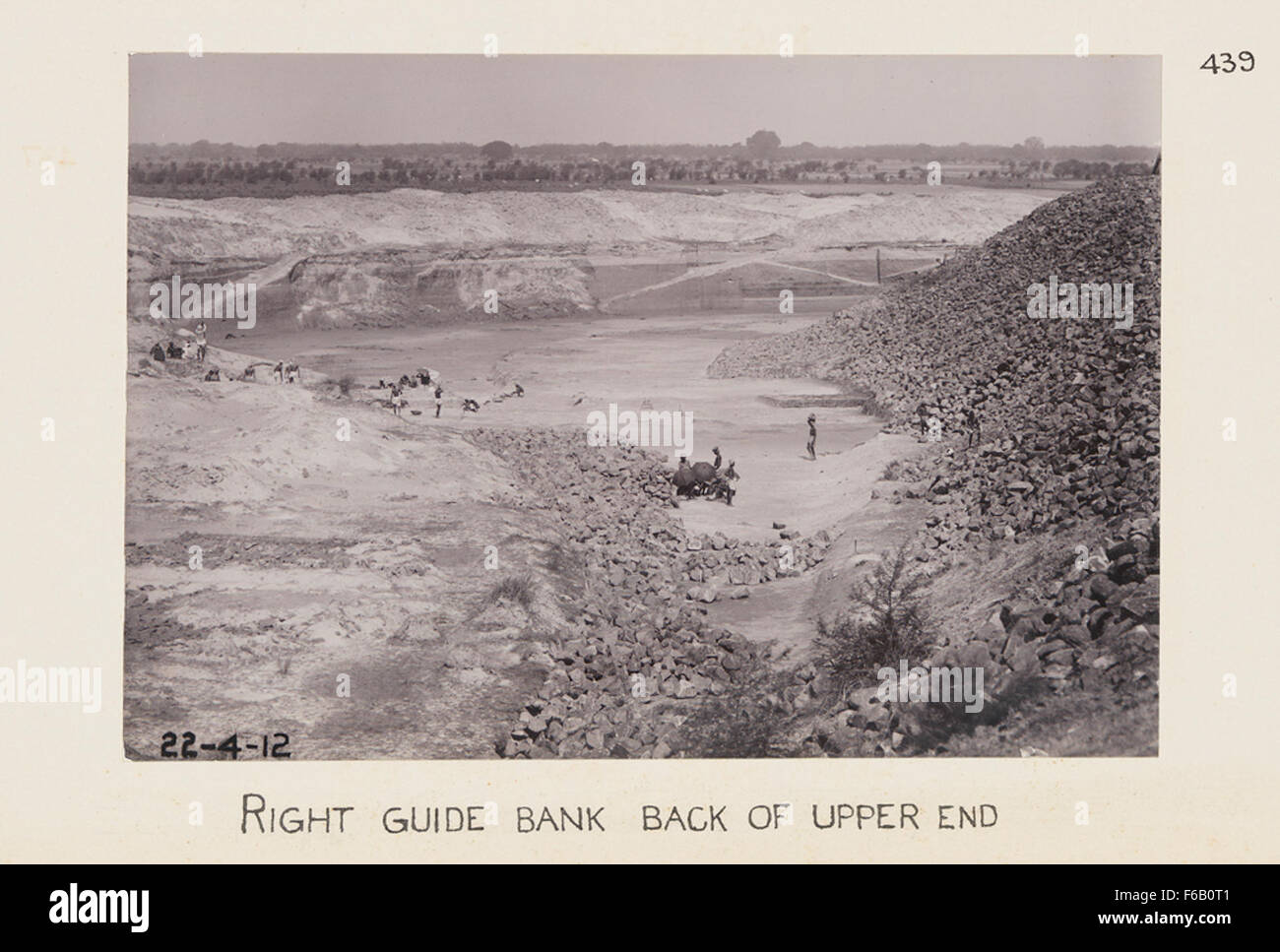 This image illustrates the construction of a railroad bridge, focusing ...