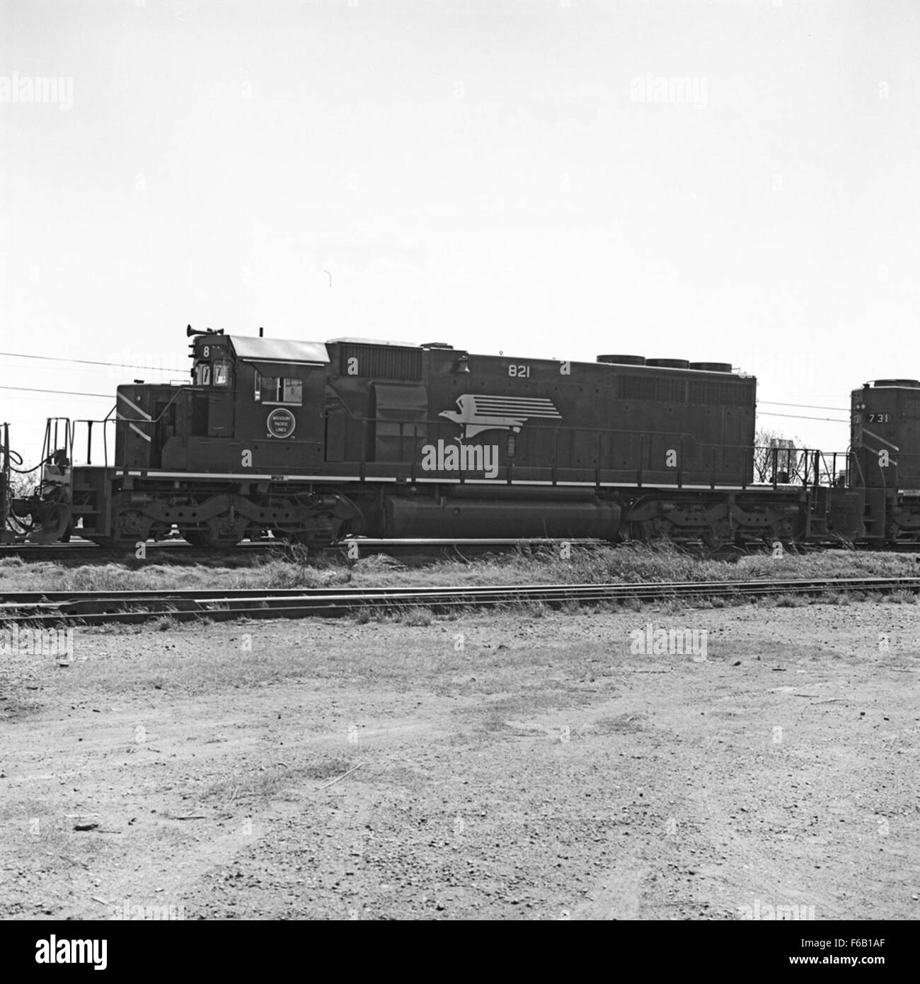 The Missouri Pacific Diesel Electric Road Switcher No. 821 is captured ...
