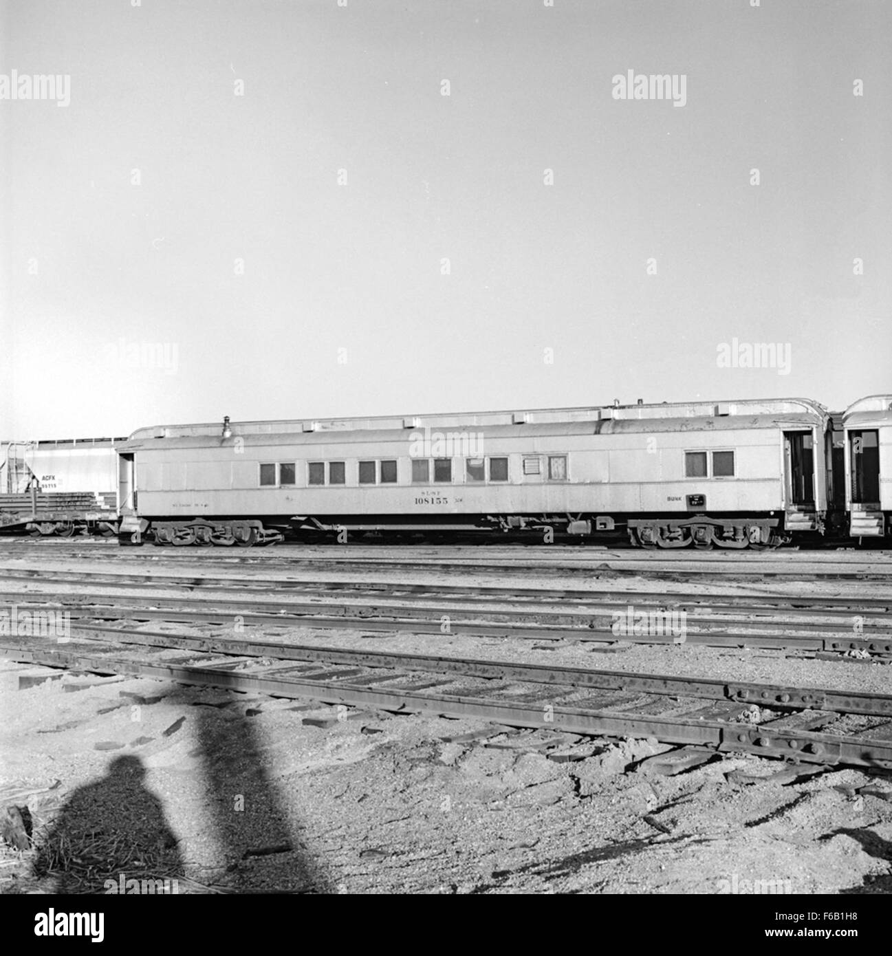 This historical image shows a Pullman Company sleeping car, identified ...