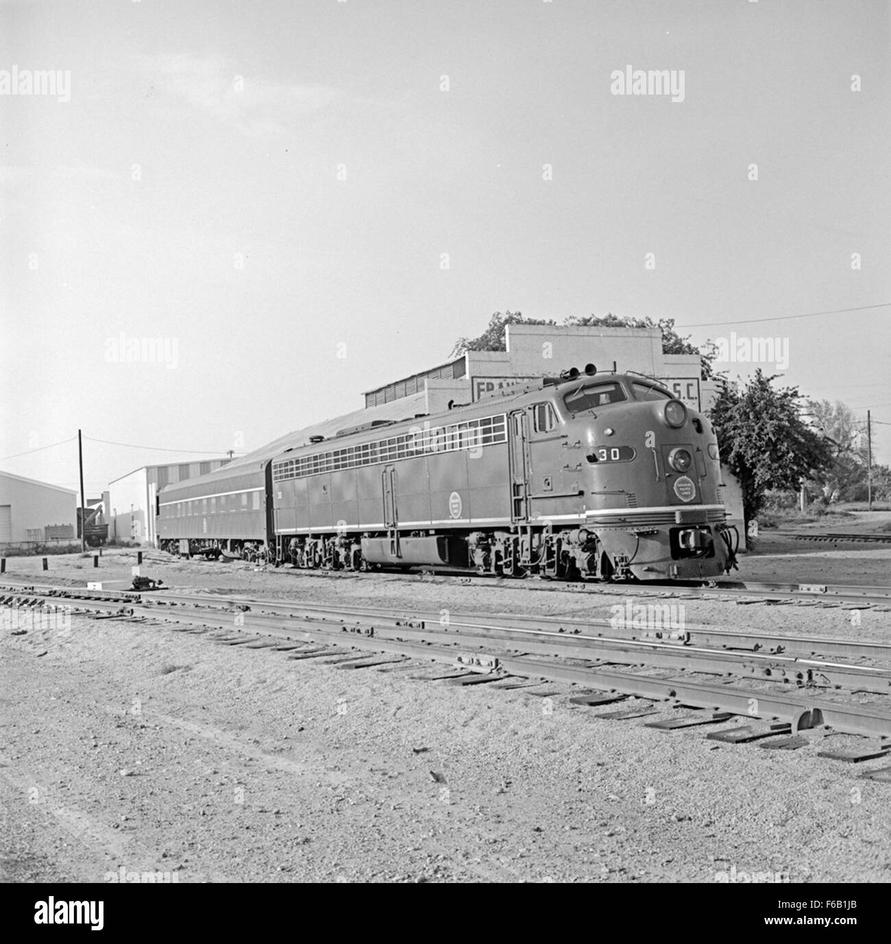 This photograph captures the Texas & Pacific Diesel Electric Passenger ...