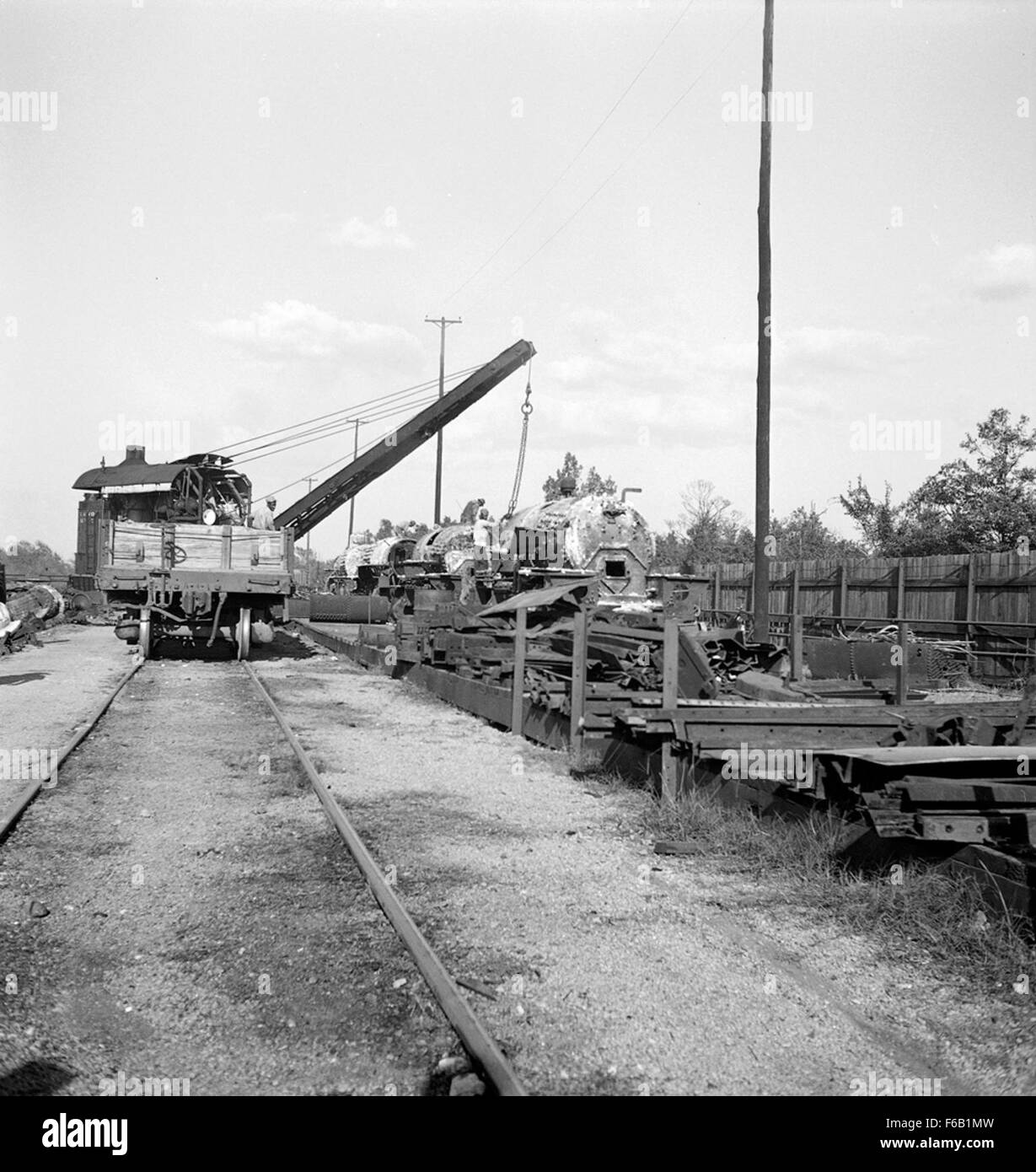This photograph captures a Southern Pacific locomotive scrap line in ...