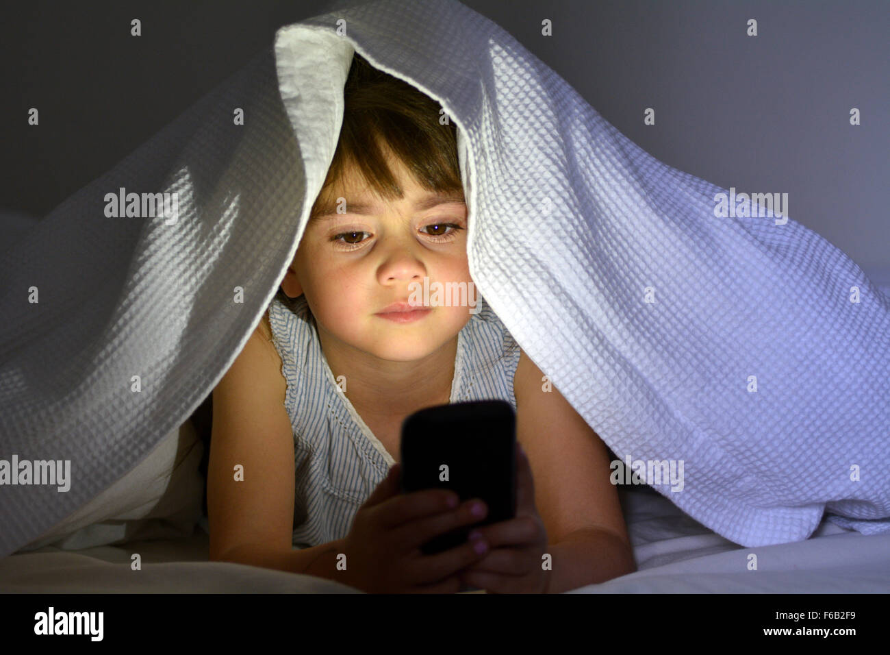 Hiding Under Covers High Resolution Stock Photography and Images - Alamy