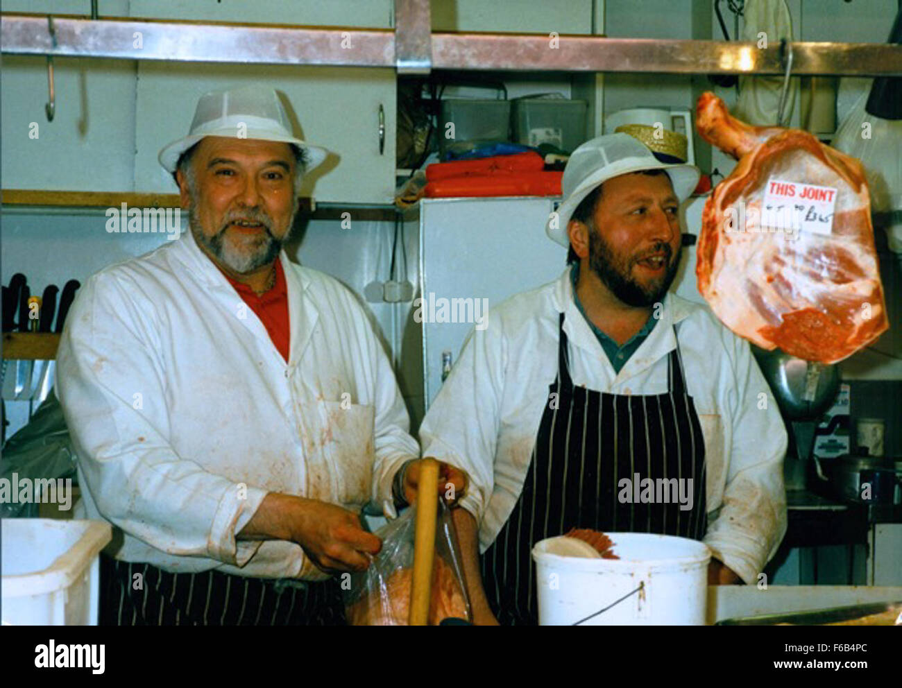 This image captures a bustling butcher’s stall at Grainger Market in ...