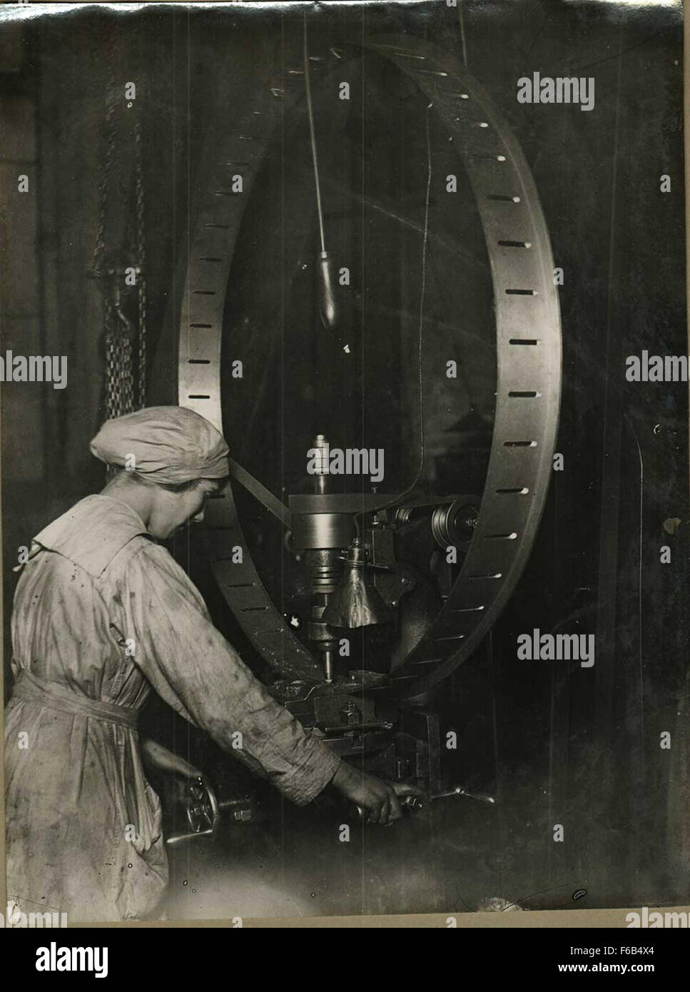 Radiusing ends of slots in mirror ring (1914 – 18 Stock Photo - Alamy