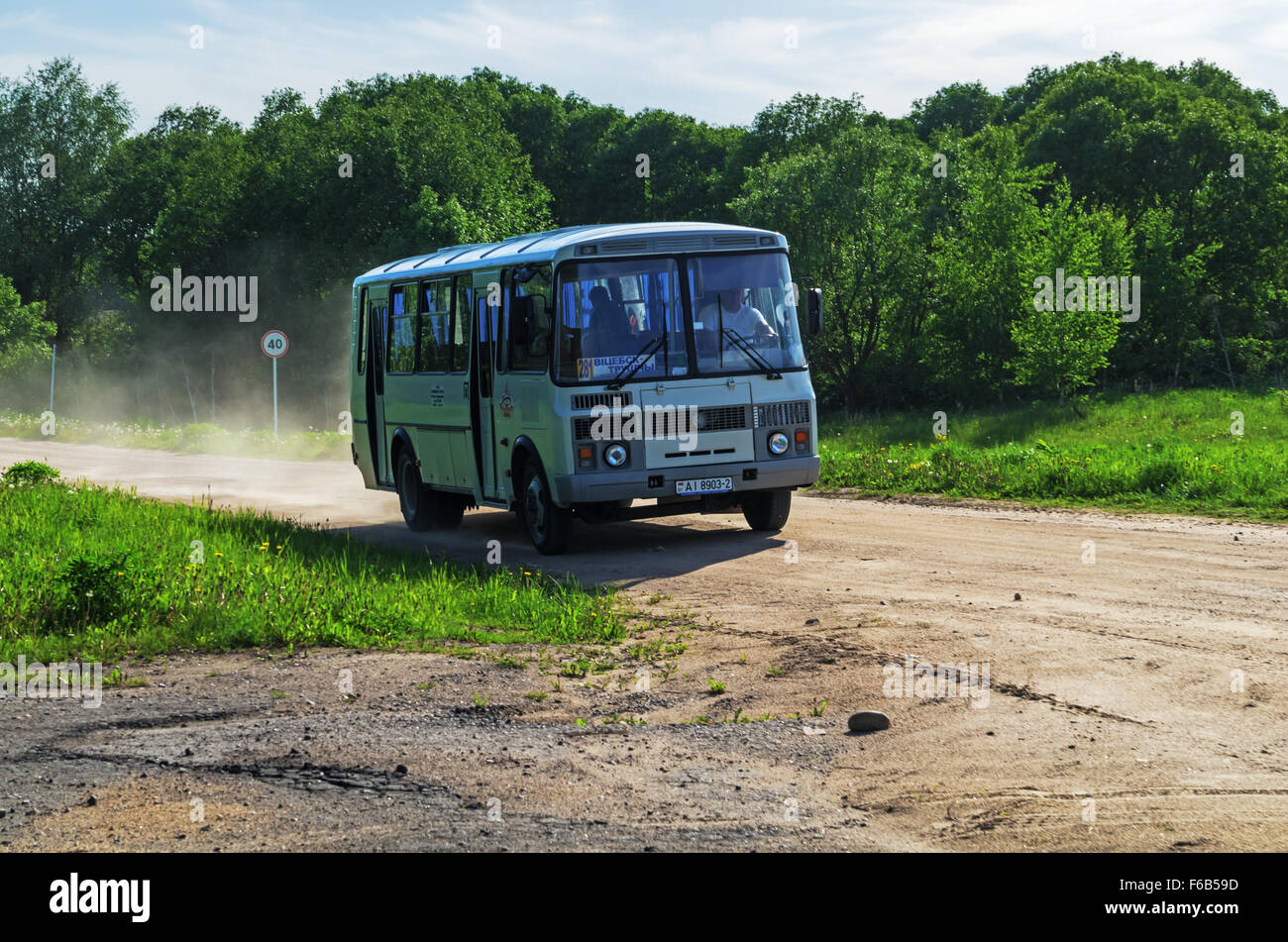 Rural road with bus Stock Photo - Alamy