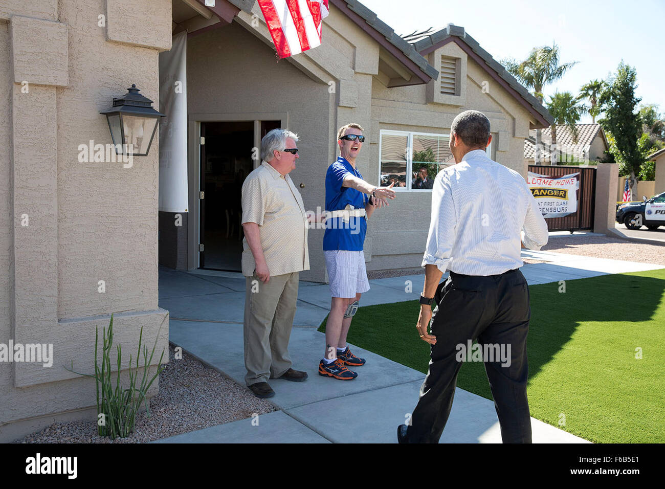 President Barack Obama is greeted by U.S. Army Ranger Sergeant First ...