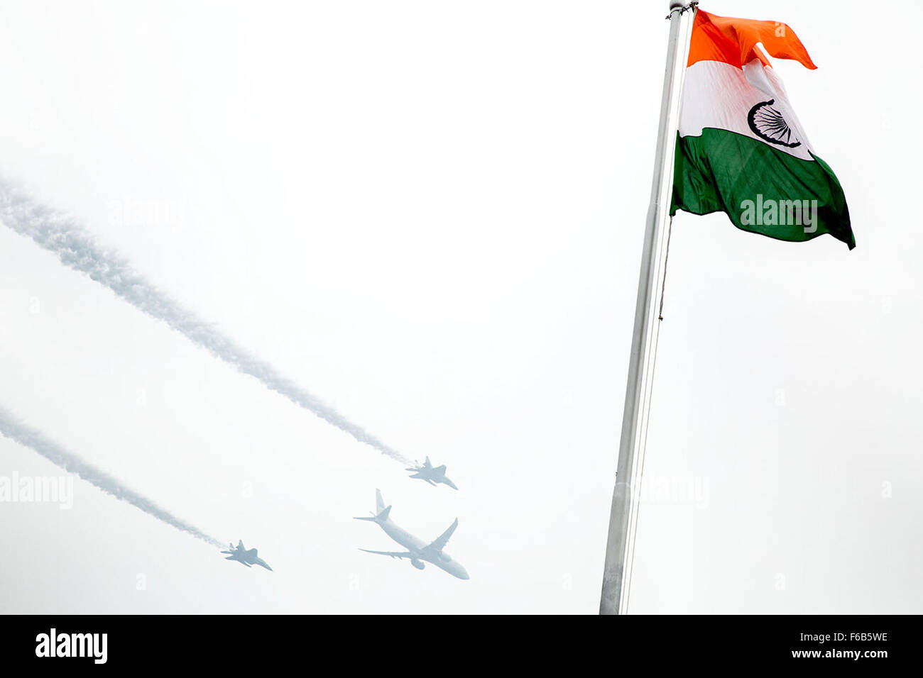 A military flyover takes place despite inclement weather during the ...